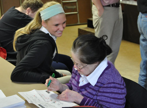 Holy Cross students learn what it means to ‘give back’ - The Record ...