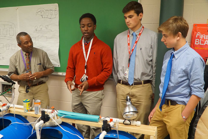 Trinity students raise fish to feed hungry - The Record Newspaper