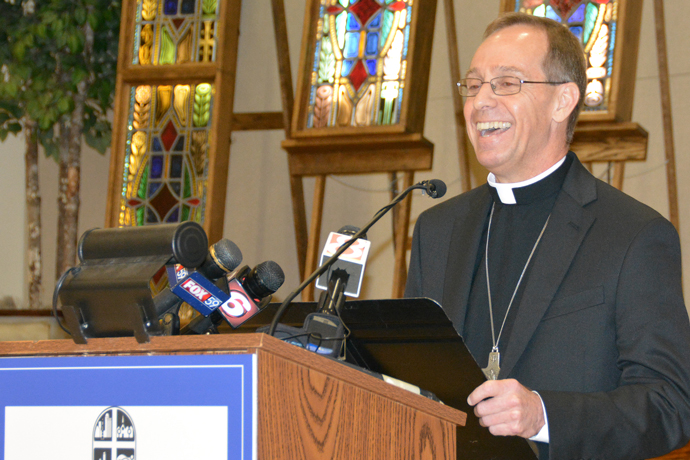 Former Louisville priest humbled, honored to lead Indianapolis ...
