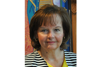 Educator honored for cultivating leaders - The Record Newspaper