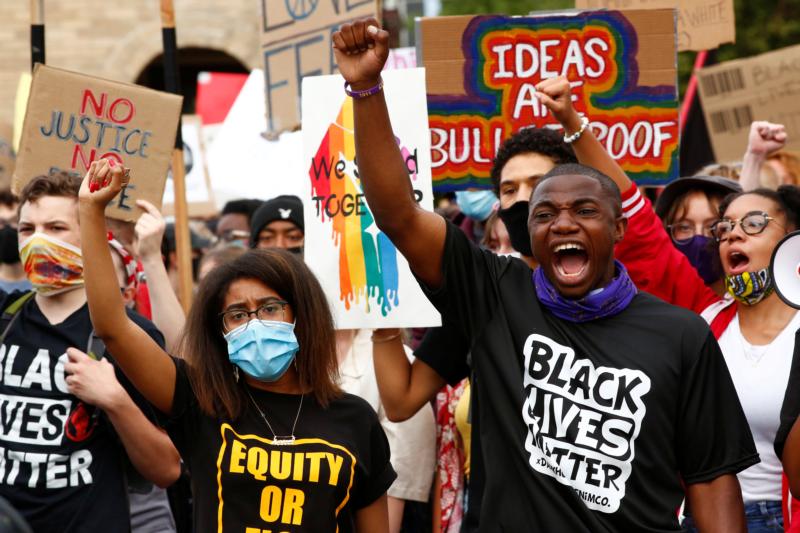 Fighting racism means putting faith in action, say Black Catholics ...