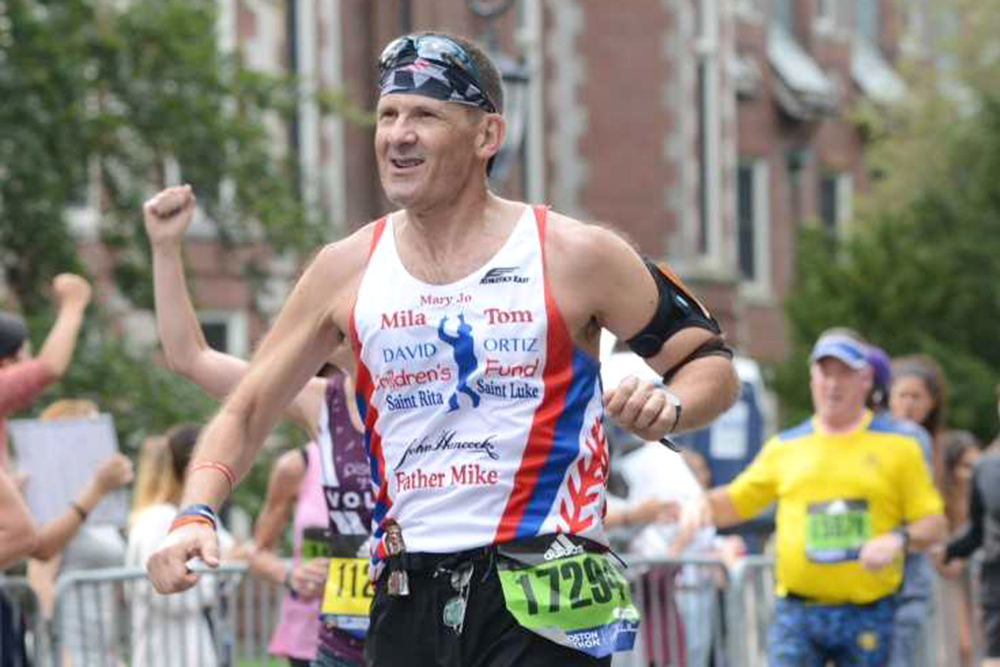 Priest brings faith to the finish line - The Record Newspaper